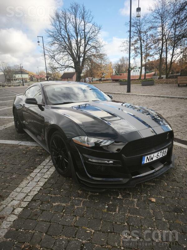 Black Ford Mustang 2020 in Saldus, with an engine capacity of 2.30 L and mileage of 178 thousand km for 24500 €, photo 1 on AUTOMOTO.COM.LV