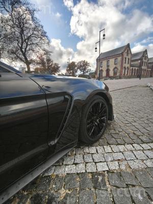 Black Ford Mustang 2020 in Saldus, with an engine capacity of 2.30 L and mileage of 178 thousand km for 24500 €, photo 10 on AUTOMOTO.COM.LV