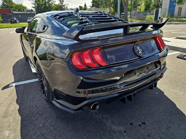 Black Ford Mustang 2020 in Siauliai, with an engine capacity of 2.30 L and mileage of 39 thousand km for 23500 €, photo 5 on AUTOMOTO.COM.LV