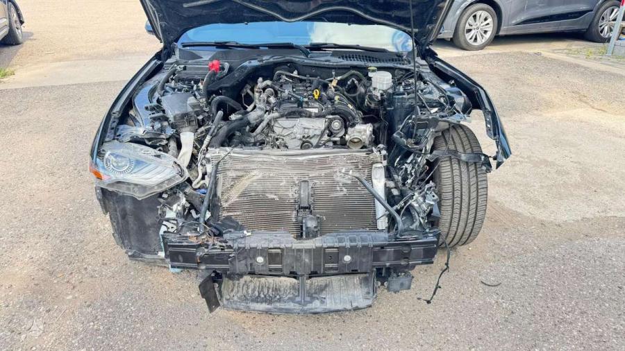 Black Ford Mustang 2021 in Ukmerge, with an engine capacity of 2.25 L and mileage of 67 thousand km for 9999 €, photo 6 on AUTOMOTO.COM.LV