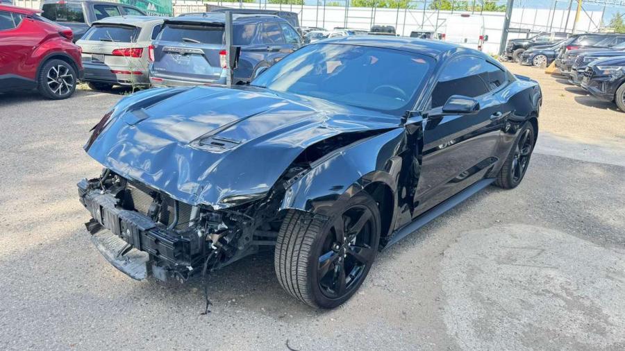 Black Ford Mustang 2021 in Ukmerge, with an engine capacity of 2.25 L and mileage of 67 thousand km for 9999 €, photo 8 on AUTOMOTO.COM.LV