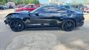 Black Ford Mustang 2021 in Ukmerge, with an engine capacity of 2.25 L and mileage of 67 thousand km for 9999 €, photo 9 on AUTOMOTO.COM.LV