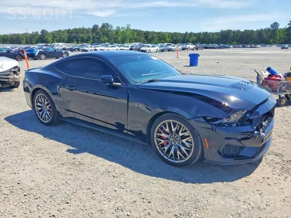 Ford Mustang 2024 LiepÄja vietnÄ Melns Ford Mustang 2024 LiepÄja, ar dzinÄja tilpumu 5.00 L un nobraukumu 14 tÅ«kst. km par 27000 ā¬, foto 5 vietnÄ AUTOMOTO.COM.LV
