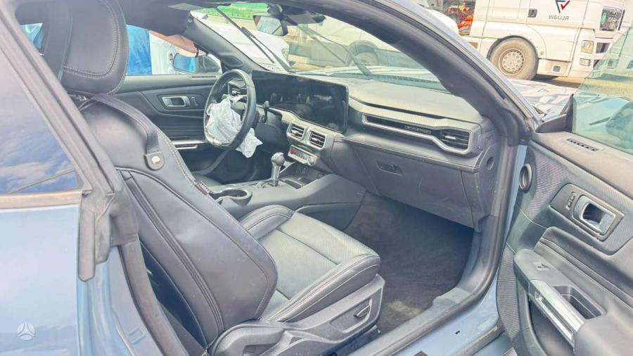 Blue Ford Mustang 2024 in Ukmerge, with an engine capacity of 2.26 L and mileage of 34 thousand km for 12890 €, photo 13 on AUTOMOTO.COM.LV