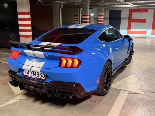 Ford Mustang 2024 Viļņa vietnē Zils Ford Mustang 2024 Viļņa, ar dzinēja tilpumu 5.04 L un nobraukumu 20 tūkst. km par 41000 €, foto 7 vietnē AUTOMOTO.COM.LV