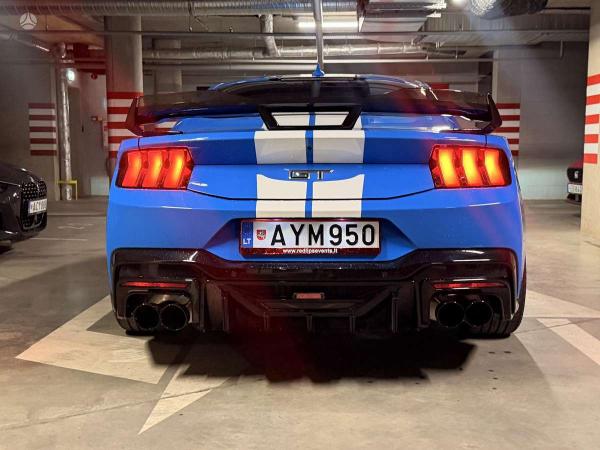 Ford Mustang 2024 Viļņa vietnē Zils Ford Mustang 2024 Viļņa, ar dzinēja tilpumu 5.04 L un nobraukumu 20 tūkst. km par 41000 €, foto 9 vietnē AUTOMOTO.COM.LV