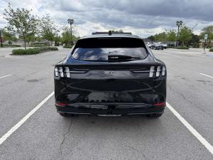 Black Ford Mustang Mach-E 2023 in Kaunas, with an engine capacity of 0.00 L and mileage of 75 thousand km for 36905 €, photo 34 on AUTOMOTO.COM.LV