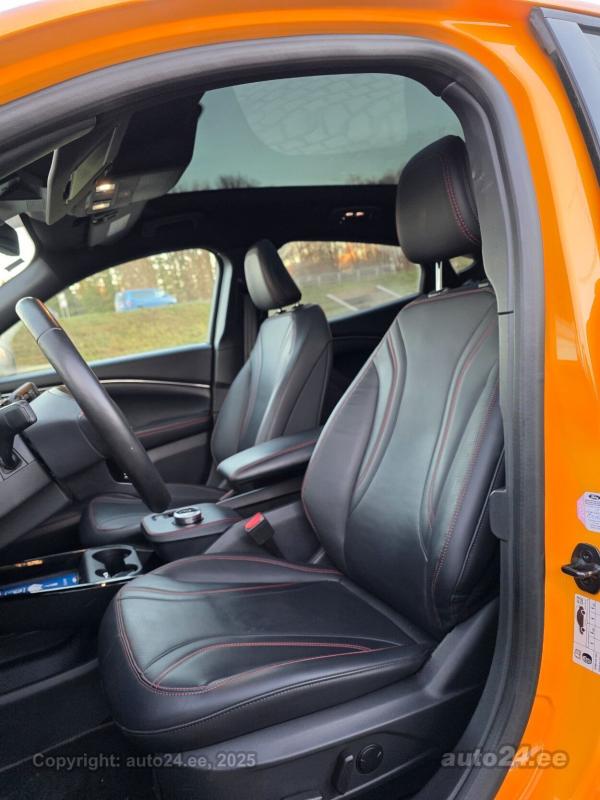 Orange Ford Mustang Mach-E 2022 in Viljandi, with an engine capacity of 0.00 L and mileage of 89 thousand km for 32500 €, photo 11 on AUTOMOTO.COM.LV