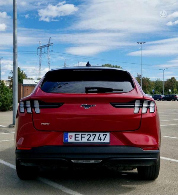 Red Ford Mustang Mach-E 2021 in Siauliai, with an engine capacity of 0.00 L and mileage of 126 thousand km for 22000 €, photo 3 on AUTOMOTO.COM.LV