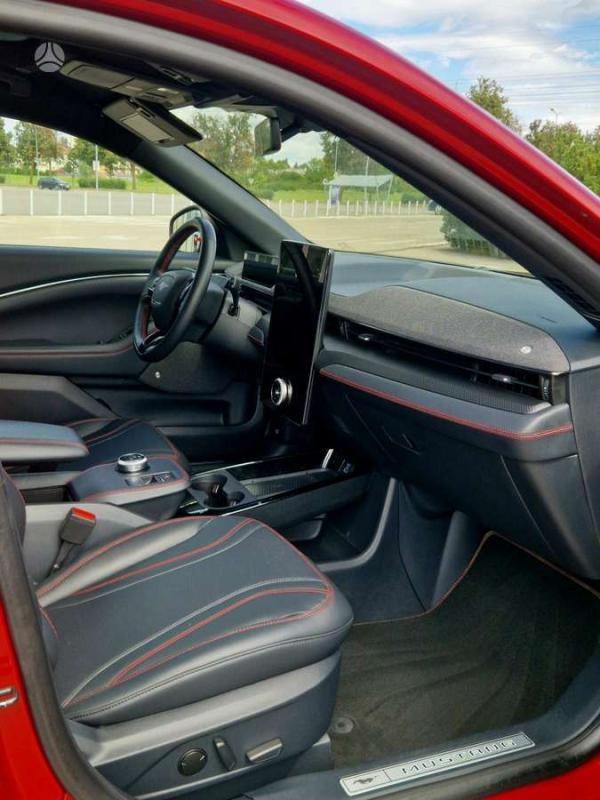Red Ford Mustang Mach-E 2021 in Siauliai, with an engine capacity of 0.00 L and mileage of 126 thousand km for 22000 €, photo 10 on AUTOMOTO.COM.LV