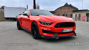 Oranžs Ford Mustang 2015 Tallina, ar dzinēja tilpumu 2.30 L un nobraukumu 95 tūkst. km par 22500 €, foto  vietnē AUTOMOTO.COM.LV