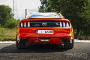 Orange Ford Mustang 2015 in Riga, with an engine capacity of 2.30 L and mileage of 56 thousand km for 23490 €, photo 7 on AUTOMOTO.COM.LV