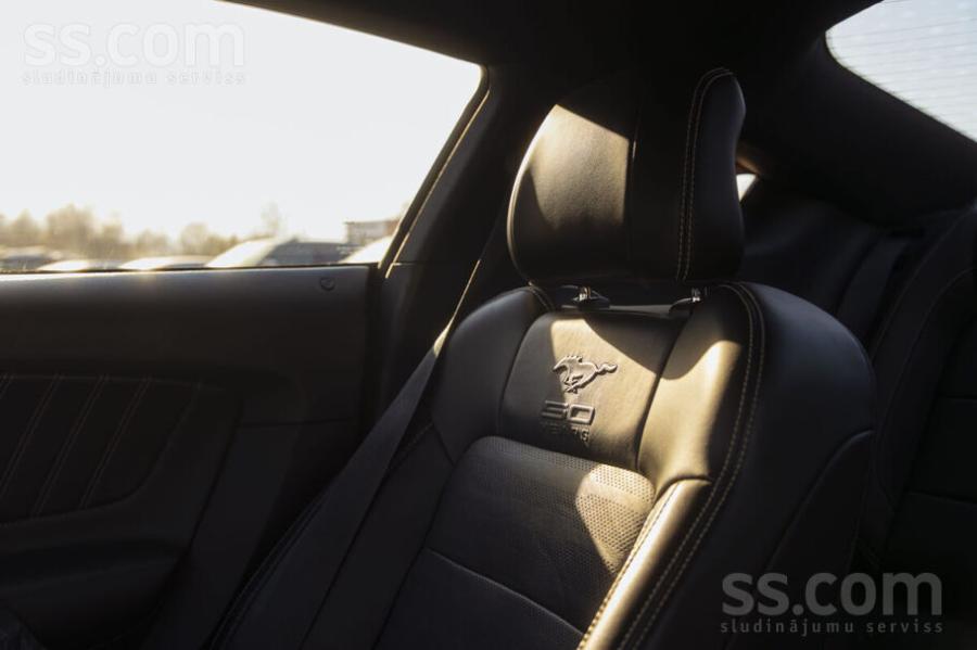 Orange Ford Mustang 2015 in Riga, with an engine capacity of 2.30 L and mileage of 56 thousand km for 23490 €, photo 13 on AUTOMOTO.COM.LV