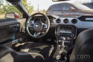 Orange Ford Mustang 2015 in Riga, with an engine capacity of 2.30 L and mileage of 56 thousand km for 23490 €, photo 16 on AUTOMOTO.COM.LV