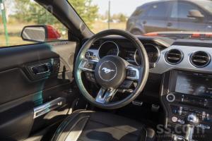 Orange Ford Mustang 2015 in Riga, with an engine capacity of 2.30 L and mileage of 56 thousand km for 23490 €, photo 17 on AUTOMOTO.COM.LV