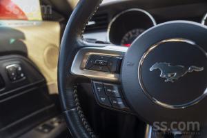 Orange Ford Mustang 2015 in Riga, with an engine capacity of 2.30 L and mileage of 56 thousand km for 23490 €, photo 18 on AUTOMOTO.COM.LV