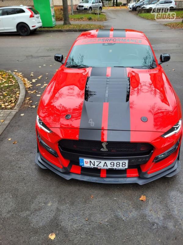 Red Ford Mustang 2023 in Siauliai, with an engine capacity of 2.30 L and mileage of 70 thousand km for 27000 €, photo 6 on AUTOMOTO.COM.LV