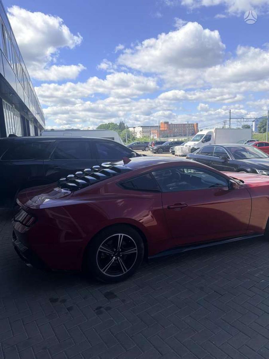 Red Ford Mustang 2024 in Kedainiai, with an engine capacity of 2.25 L and mileage of 21 thousand km for 30999 €, photo 3 on AUTOMOTO.COM.LV