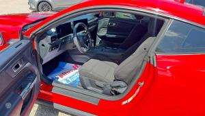 Red Ford Mustang 2024 in Ukmerge, with an engine capacity of 5.04 L and mileage of 62 thousand km for 23999 €, photo 12 on AUTOMOTO.COM.LV