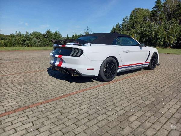 Ford Mustang 2019 in Kaunas on AUTOMOTO.COM.LV White Ford Mustang 2019 in Kaunas, with an engine capacity of 2.25 L and mileage of 20 thousand km for 26300 €, photo 11 on AUTOMOTO.COM.LV