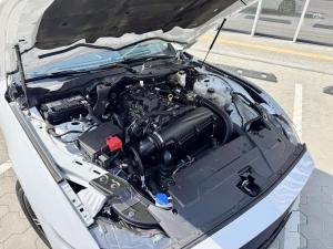 White Ford Mustang 2024 in Vilnius, with an engine capacity of 2.30 L and mileage of 60 thousand km for 28799 €, photo 26 on AUTOMOTO.COM.LV