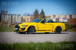 Yellow Ford Mustang 2015 in Riga, with an engine capacity of 3.70 L and mileage of 130 thousand km for 26500 €, photo 5 on AUTOMOTO.COM.LV