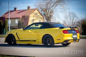 Yellow Ford Mustang 2015 in Riga, with an engine capacity of 3.70 L and mileage of 130 thousand km for 26500 €, photo 18 on AUTOMOTO.COM.LV