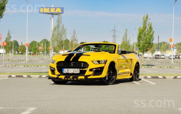 Yellow Ford Mustang 2015 in Riga, with an engine capacity of 3.70 L and mileage of 131 thousand km for 25990 €, photo 1 on AUTOMOTO.COM.LV