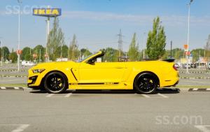 Yellow Ford Mustang 2015 in Riga, with an engine capacity of 3.70 L and mileage of 131 thousand km for 24590 €, photo 5 on AUTOMOTO.COM.LV