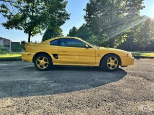 Dzeltens Ford Mustang 1998 Kelmė, ar dzinēja tilpumu 4.60 L un nobraukumu 153 tūkst. km par 6600 €, foto 3 vietnē AUTOMOTO.COM.LV