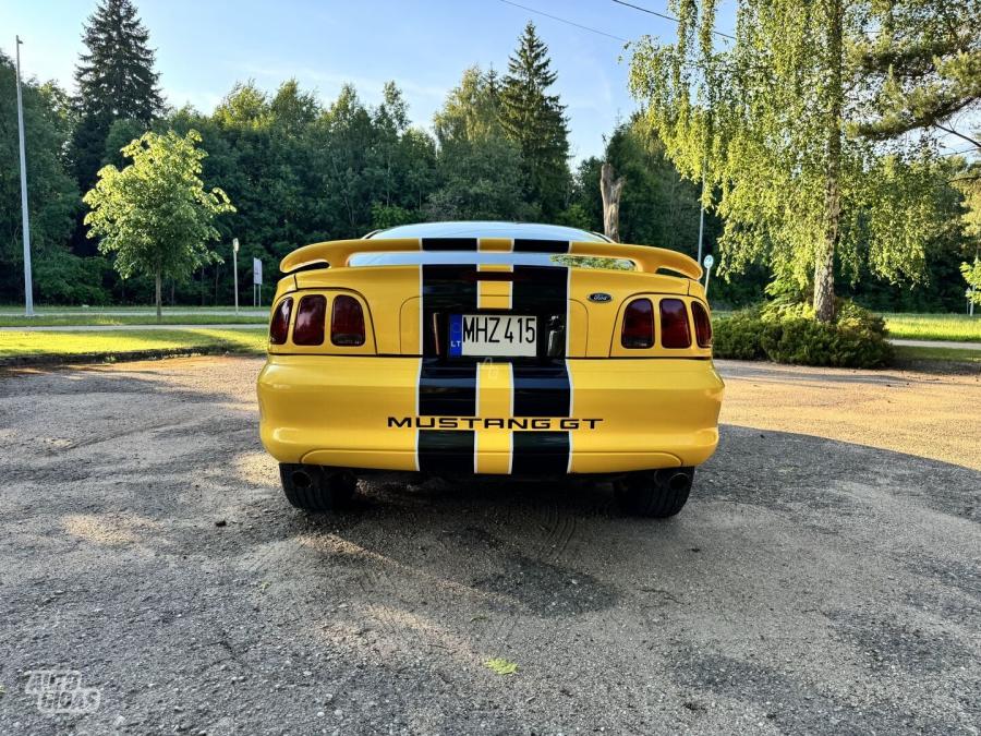 Dzeltens Ford Mustang 1998 Kelmė, ar dzinēja tilpumu 4.60 L un nobraukumu 153 tūkst. km par 6600 €, foto 5 vietnē AUTOMOTO.COM.LV