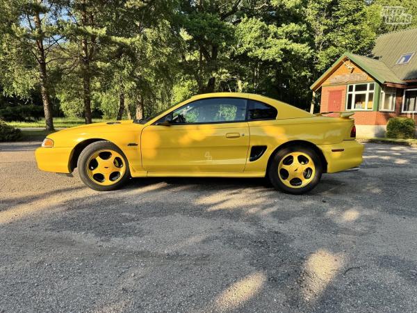 Yellow Ford Mustang 1998 in Kelme, with an engine capacity of 4.60 L and mileage of 153 thousand km for 6600 €, photo 6 on AUTOMOTO.COM.LV