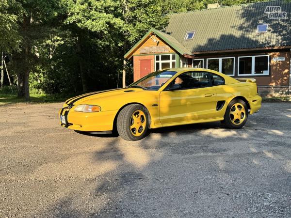 Yellow Ford Mustang 1998 in Kelme, with an engine capacity of 4.60 L and mileage of 153 thousand km for 6600 €, photo 7 on AUTOMOTO.COM.LV
