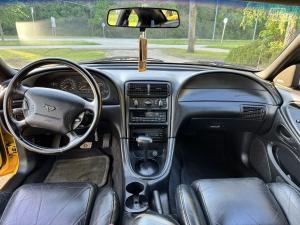 Dzeltens Ford Mustang 1998 Kelmė, ar dzinēja tilpumu 4.60 L un nobraukumu 153 tūkst. km par 6600 €, foto 14 vietnē AUTOMOTO.COM.LV