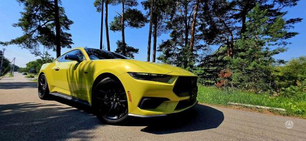 Dzeltens Ford Mustang 2025 Kauņa, ar dzinēja tilpumu 2.30 L un nobraukumu 14 tūkst. km par 30900 €, foto 1 vietnē AUTOMOTO.COM.LV