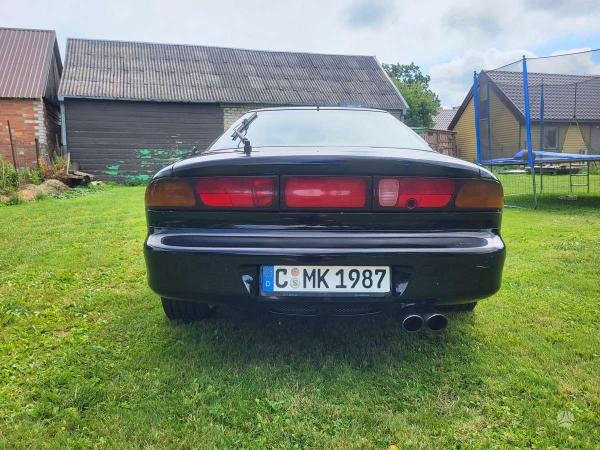 Black Ford Probe 1995 in Kelme, with an engine capacity of 2.50 L and mileage of 114 thousand km for 5500 €, photo 6 on AUTOMOTO.COM.LV