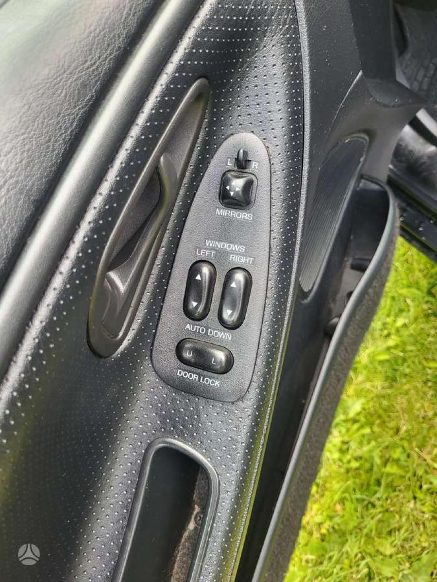 Black Ford Probe 1995 in Kelme, with an engine capacity of 2.50 L and mileage of 114 thousand km for 5500 €, photo 11 on AUTOMOTO.COM.LV