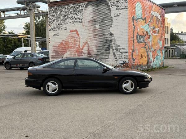 Ford Probe 1996 in Riga on AUTOMOTO.COM.LV Black Ford Probe 1996 in Riga, with an engine capacity of 2.00 L and mileage of 148 thousand km for 1800 €, photo 6 on AUTOMOTO.COM.LV