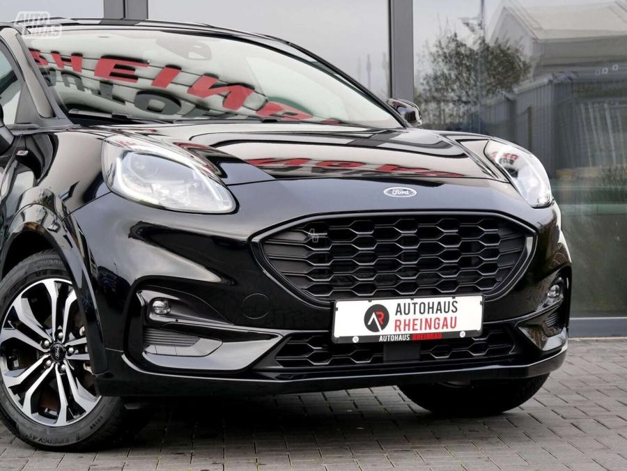 Black Ford Puma 2024 in Kaunas, with an engine capacity of 1.00 L and mileage of 20 thousand km for 24357 €, photo 7 on AUTOMOTO.COM.LV