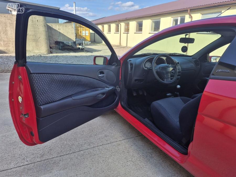 Red Ford Puma 1998 in Klaipeda, with an engine capacity of 1.40 L and mileage of 37 thousand km for 3999 €, photo 15 on AUTOMOTO.COM.LV