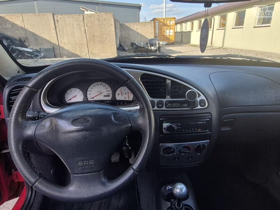 Red Ford Puma 1998 in Klaipeda, with an engine capacity of 1.40 L and mileage of 37 thousand km for 3999 €, photo 17 on AUTOMOTO.COM.LV