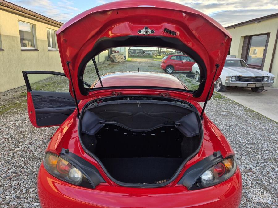 Red Ford Puma 1998 in Klaipeda, with an engine capacity of 1.40 L and mileage of 37 thousand km for 3999 €, photo 19 on AUTOMOTO.COM.LV