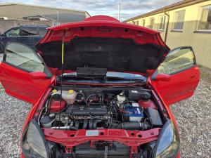 Red Ford Puma 1998 in Klaipeda, with an engine capacity of 1.40 L and mileage of 37 thousand km for 3999 €, photo 20 on AUTOMOTO.COM.LV