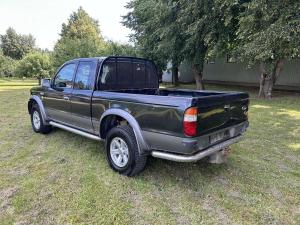 Black Ford Ranger 2006 in Kretinga, with an engine capacity of 2.50 L and mileage of 133 thousand km for 2650 €, photo 11 on AUTOMOTO.COM.LV