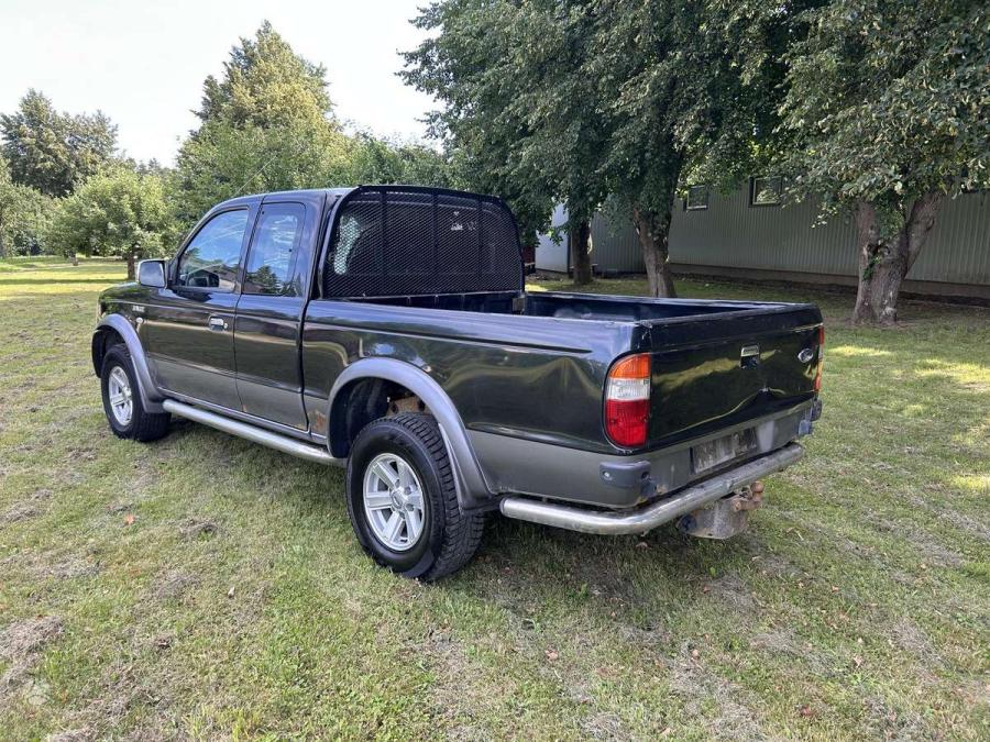 Black Ford Ranger 2006 in Kretinga, with an engine capacity of 2.50 L and mileage of 133 thousand km for 2650 €, photo 11 on AUTOMOTO.COM.LV