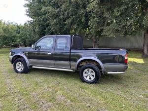 Black Ford Ranger 2006 in Kretinga, with an engine capacity of 2.50 L and mileage of 133 thousand km for 2650 €, photo 12 on AUTOMOTO.COM.LV