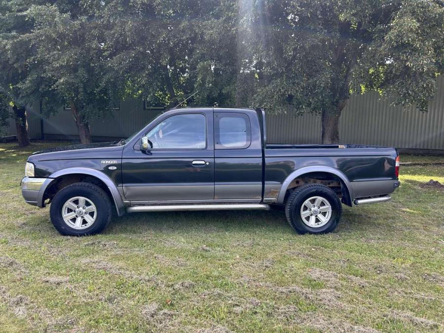 Black Ford Ranger 2006 in Kretinga, with an engine capacity of 2.50 L and mileage of 133 thousand km for 2650 €, photo 13 on AUTOMOTO.COM.LV
