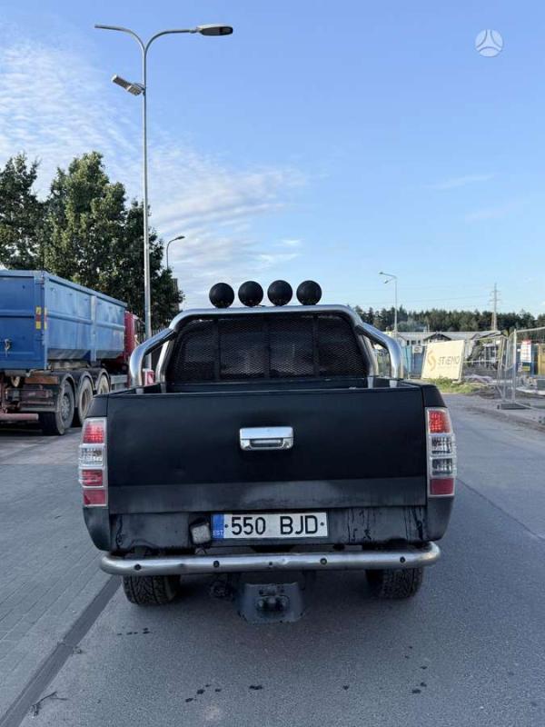Black Ford Ranger 2008 in Kaunas, with an engine capacity of 2.50 L and mileage of 320 thousand km for 4950 €, photo 7 on AUTOMOTO.COM.LV