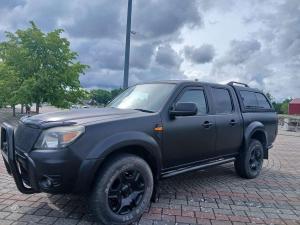 Black Ford Ranger 2010 in Silute, with an engine capacity of 2.50 L and mileage of 137 thousand km for 4250 €, photo 3 on AUTOMOTO.COM.LV