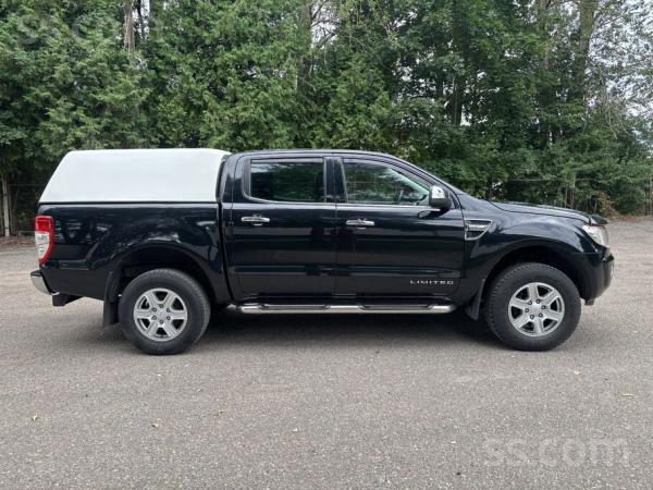 Black Ford Ranger 2014 in Ogre, with an engine capacity of 2.20 L and mileage of 216 thousand km for 11850 €, photo 1 on AUTOMOTO.COM.LV